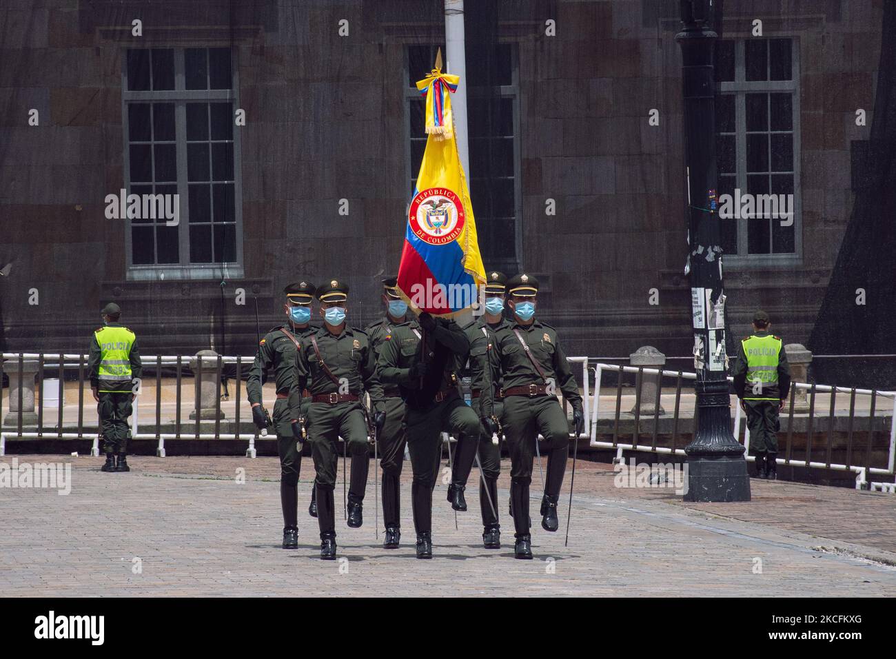 Members of the national police parade during the taking office ceremony ...