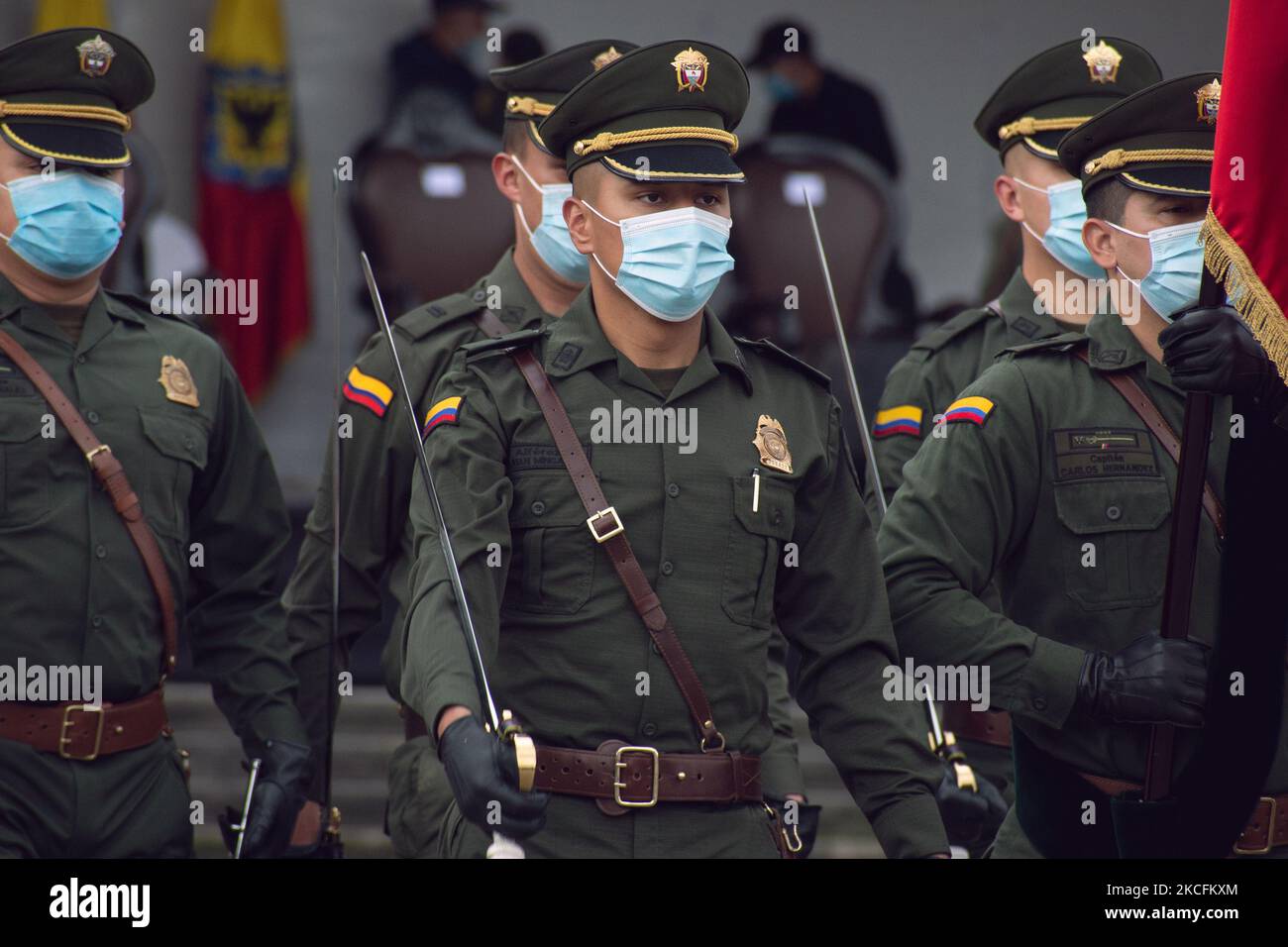 Members of the national police parade during the taking office ceremony ...