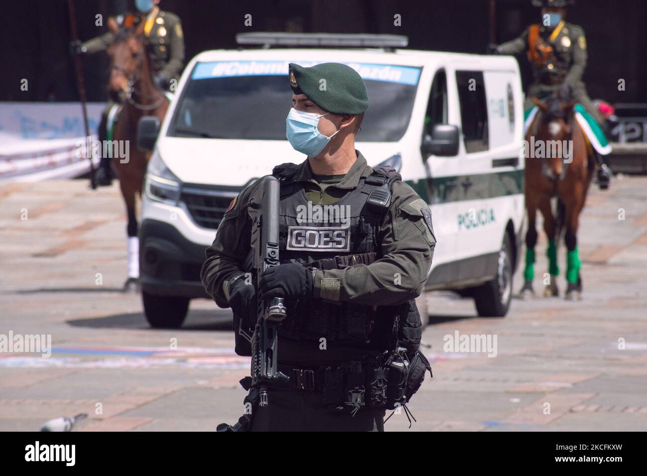Members of the national police parade during the taking office ceremony ...