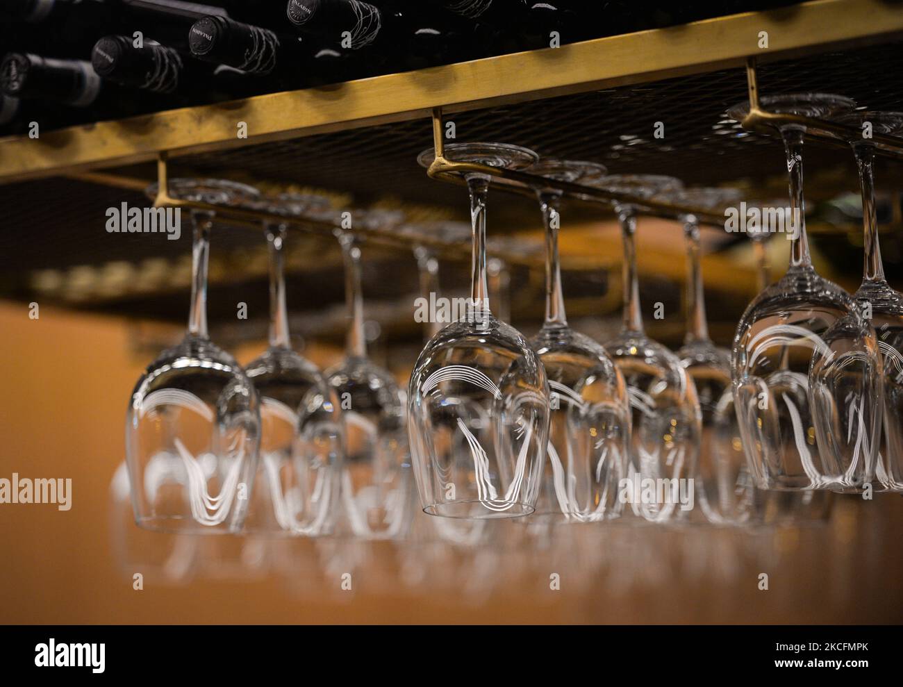 A set of clean and ready wine glasses seen inside BAH33 - The Authentic ...