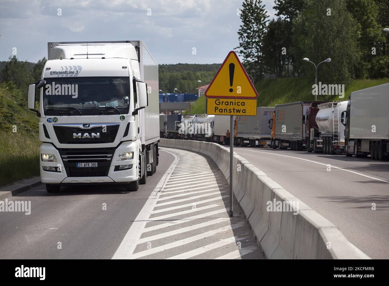 TIR trucks waits on EU border crossing in Bobrowniki on June 6, 2021 ...