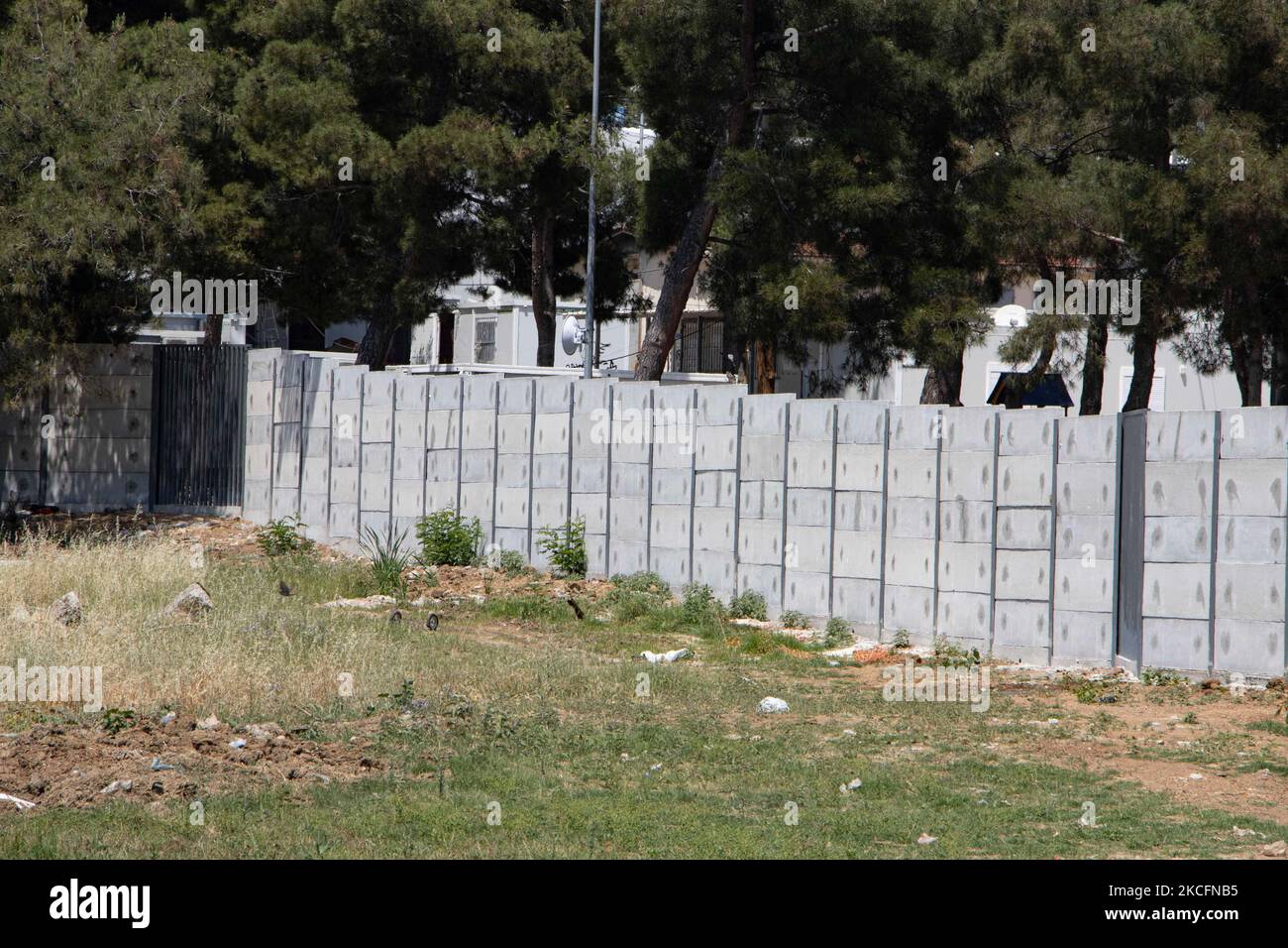 Greece is building new concrete walls around the refugee camps across ...