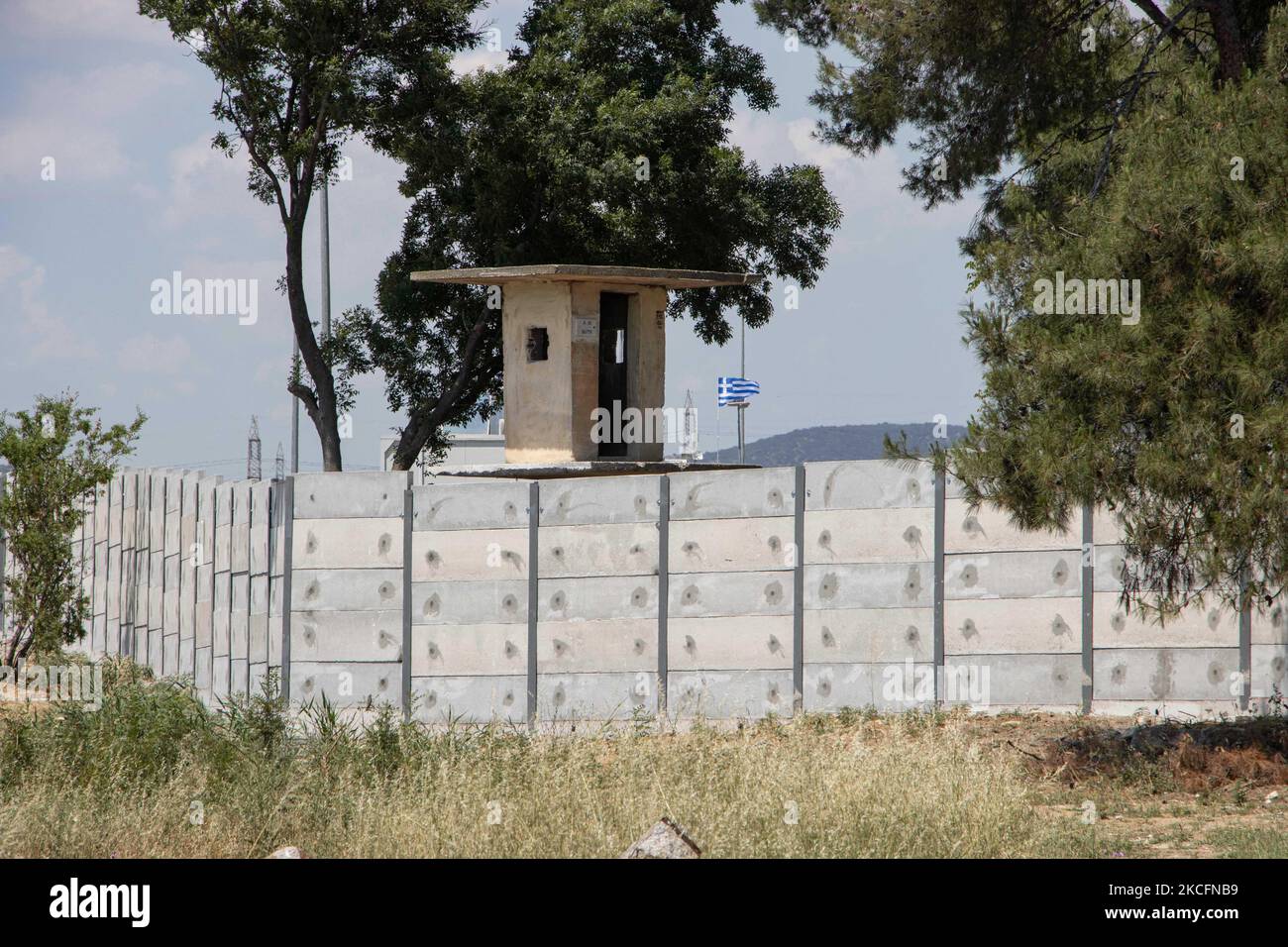 Greece is building new concrete walls around the refugee camps across ...