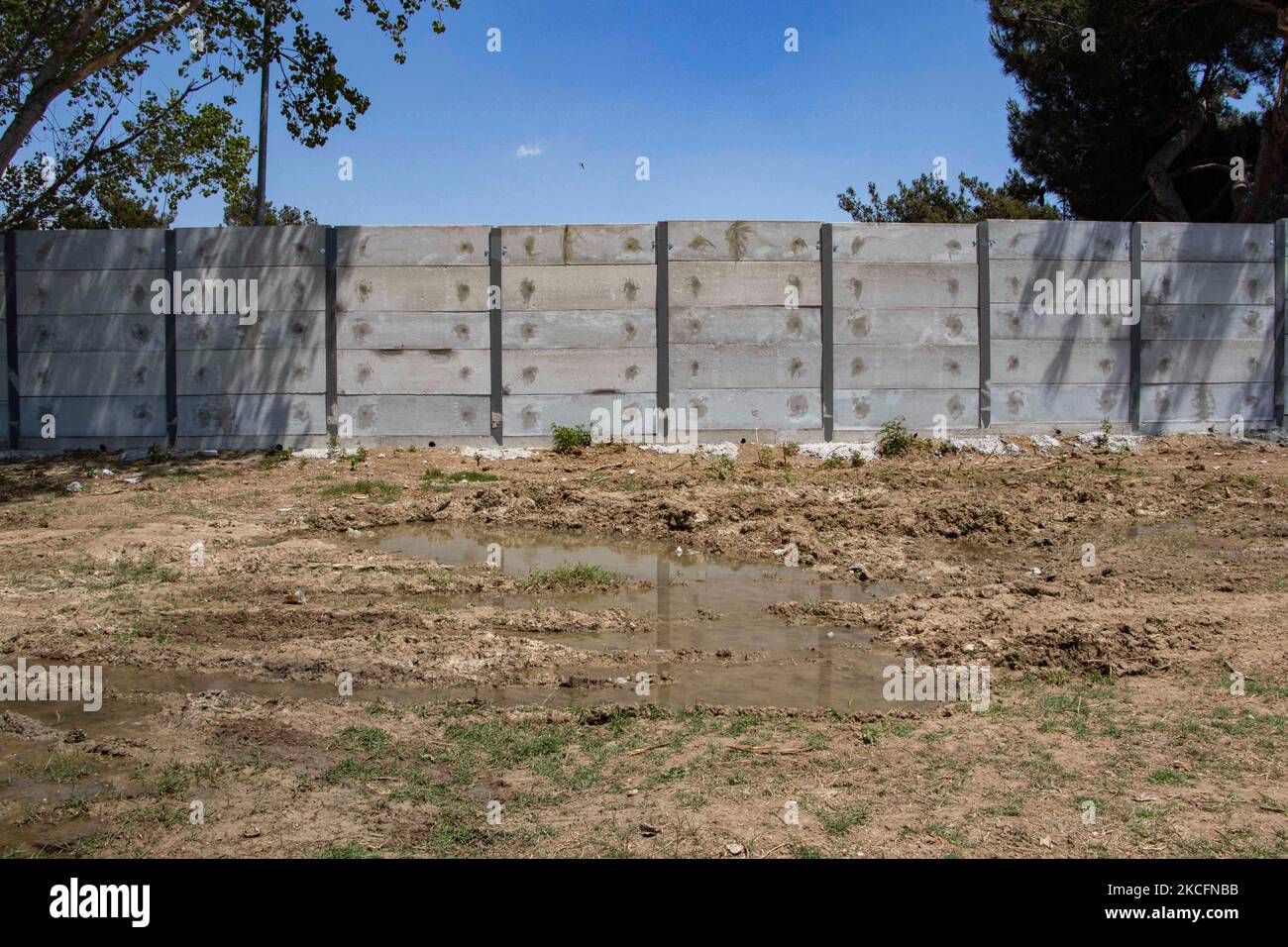 Greece is building new concrete walls around the refugee camps across ...