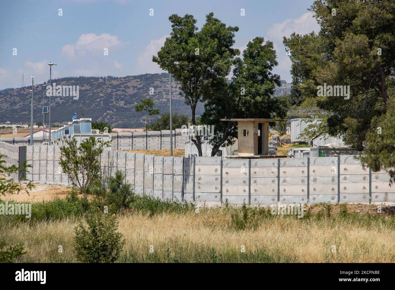 Greece is building new concrete walls around the refugee camps across ...