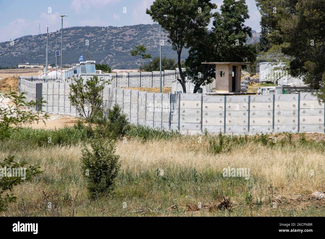 Greece is building new concrete walls around the refugee camps across ...