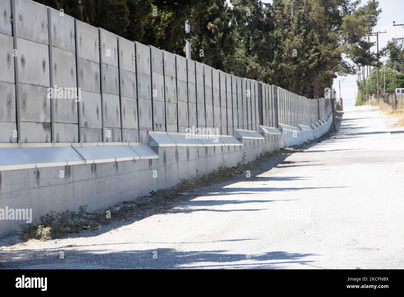 Greece is building new concrete walls around the refugee camps across ...