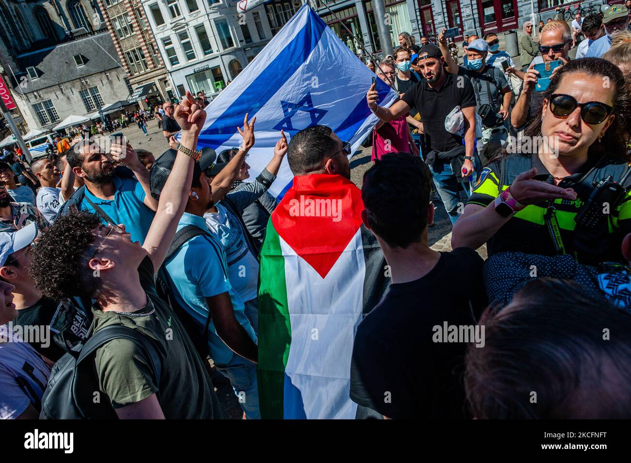 Palestinian people are confronting Israeli people demonstrating at the ...