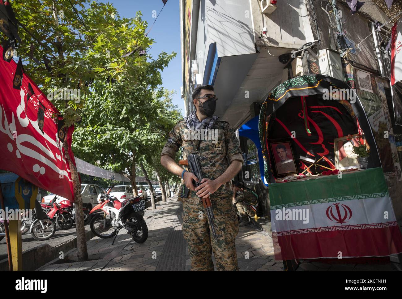 An armed member of the Islamic Revolutionary Guard Corps (IRGC ...
