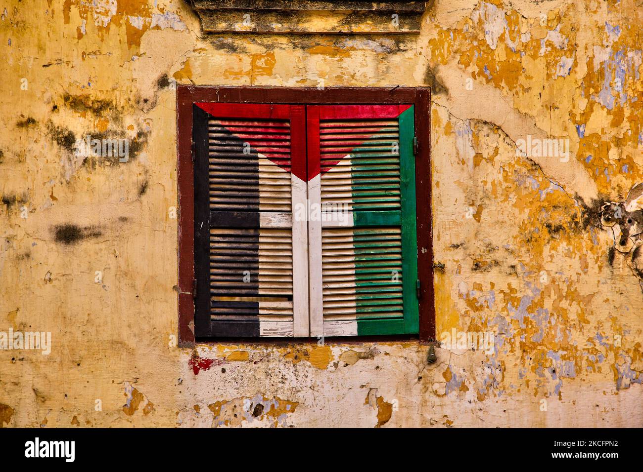 Window painted with the colours of the Palestinian flag in Tangier ...