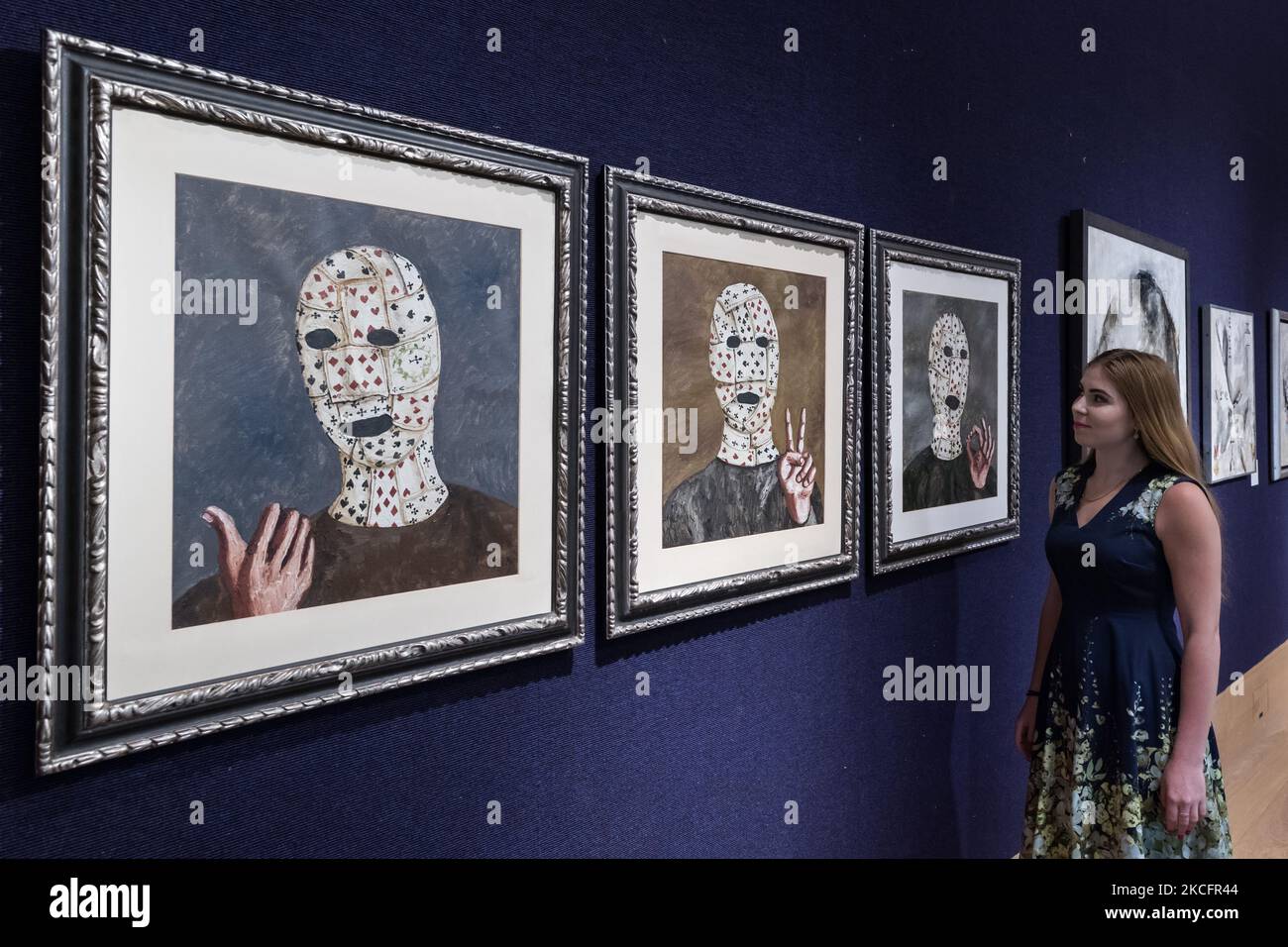 LONDON, UNITED KINGDOM - JUNE 07, 2021: A staff member looks at ...
