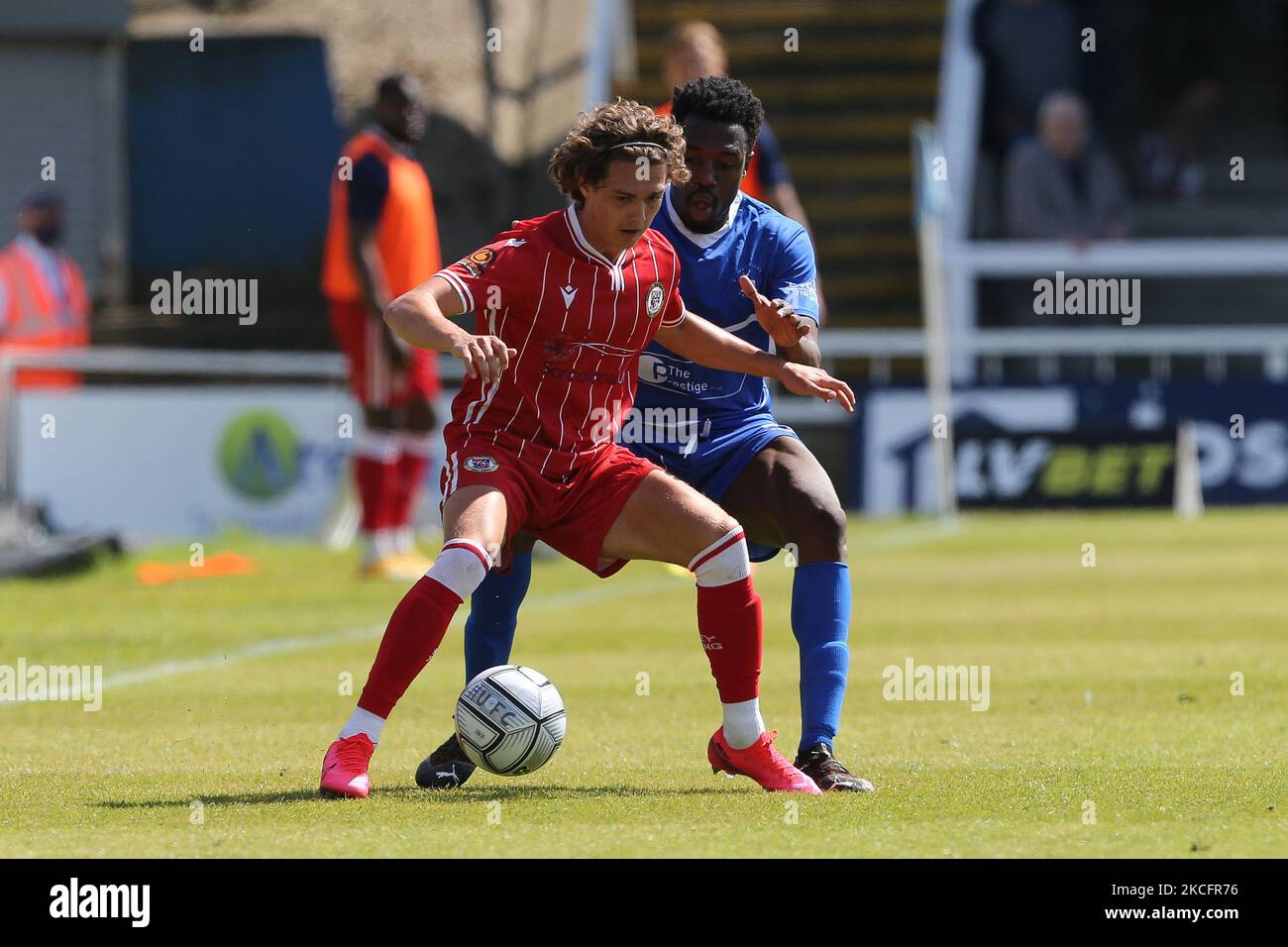Harry Forster of Bromley battles for possession with Timi Odusina of ...