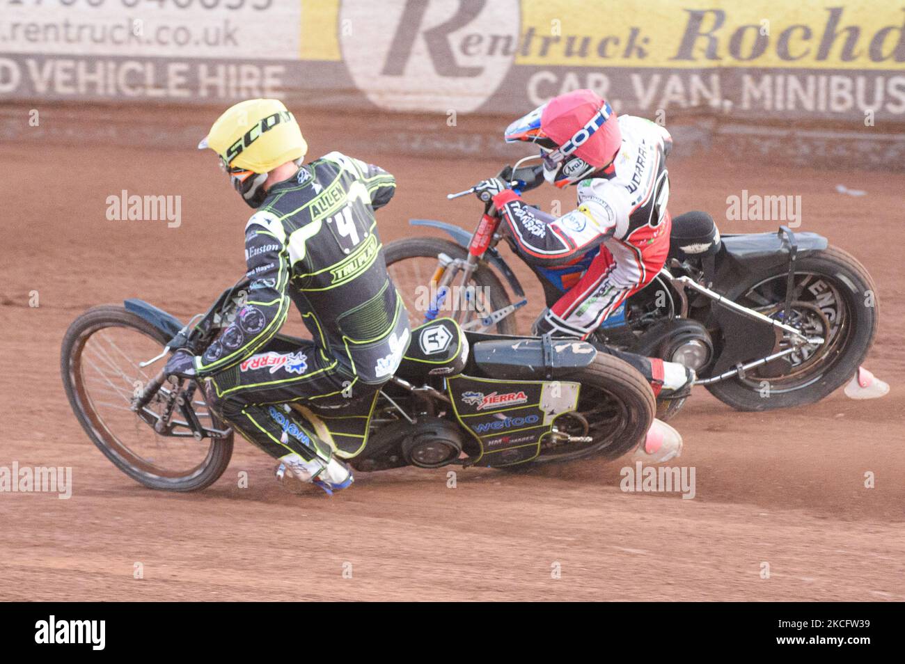 Jake Allen (Yellow) collides with Steve Worrall (Red) on the final lap ...