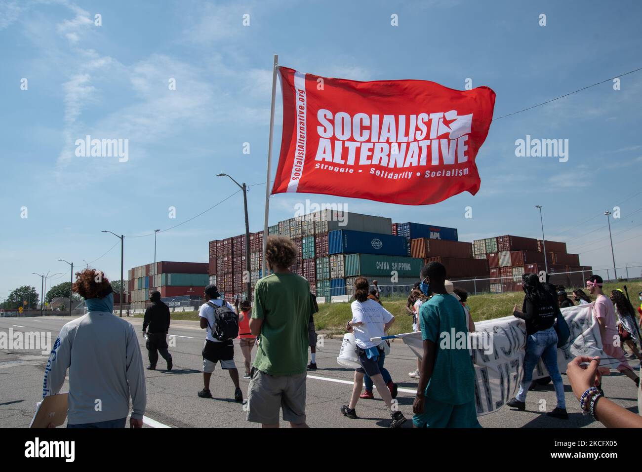 A coalition of 100+ activists from varying organizations like Michigan ...