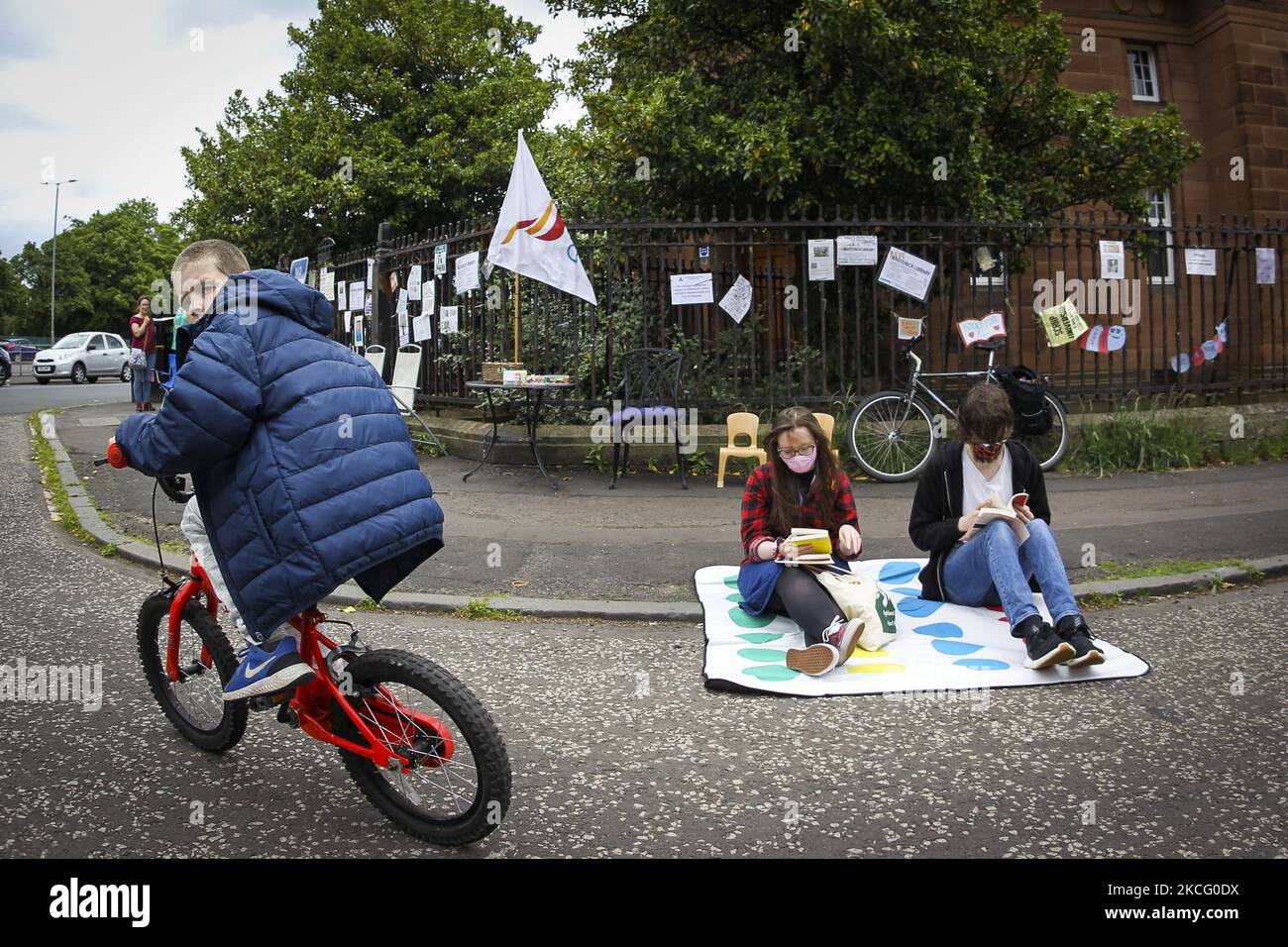 Protestors take part in a library read-in outside Whiteinch Library on ...