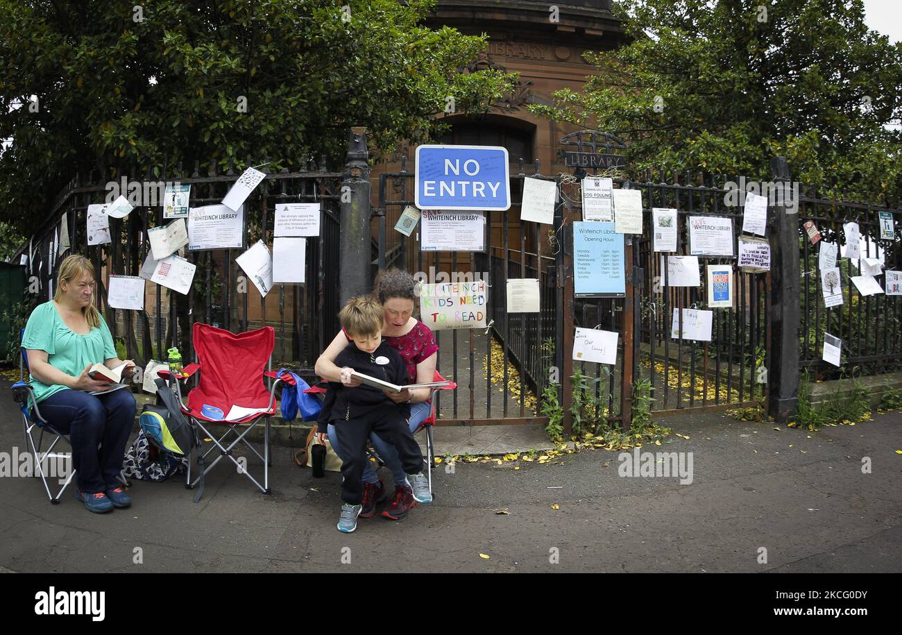 Protestors take part in a library read-in outside Whiteinch Library on ...