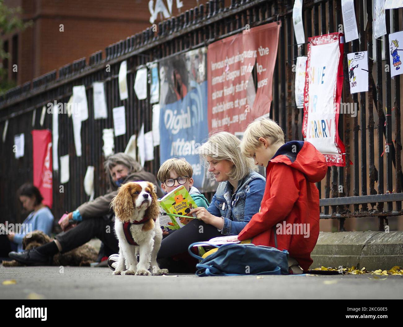 Protestors take part in a library read-in outside Whiteinch Library on ...