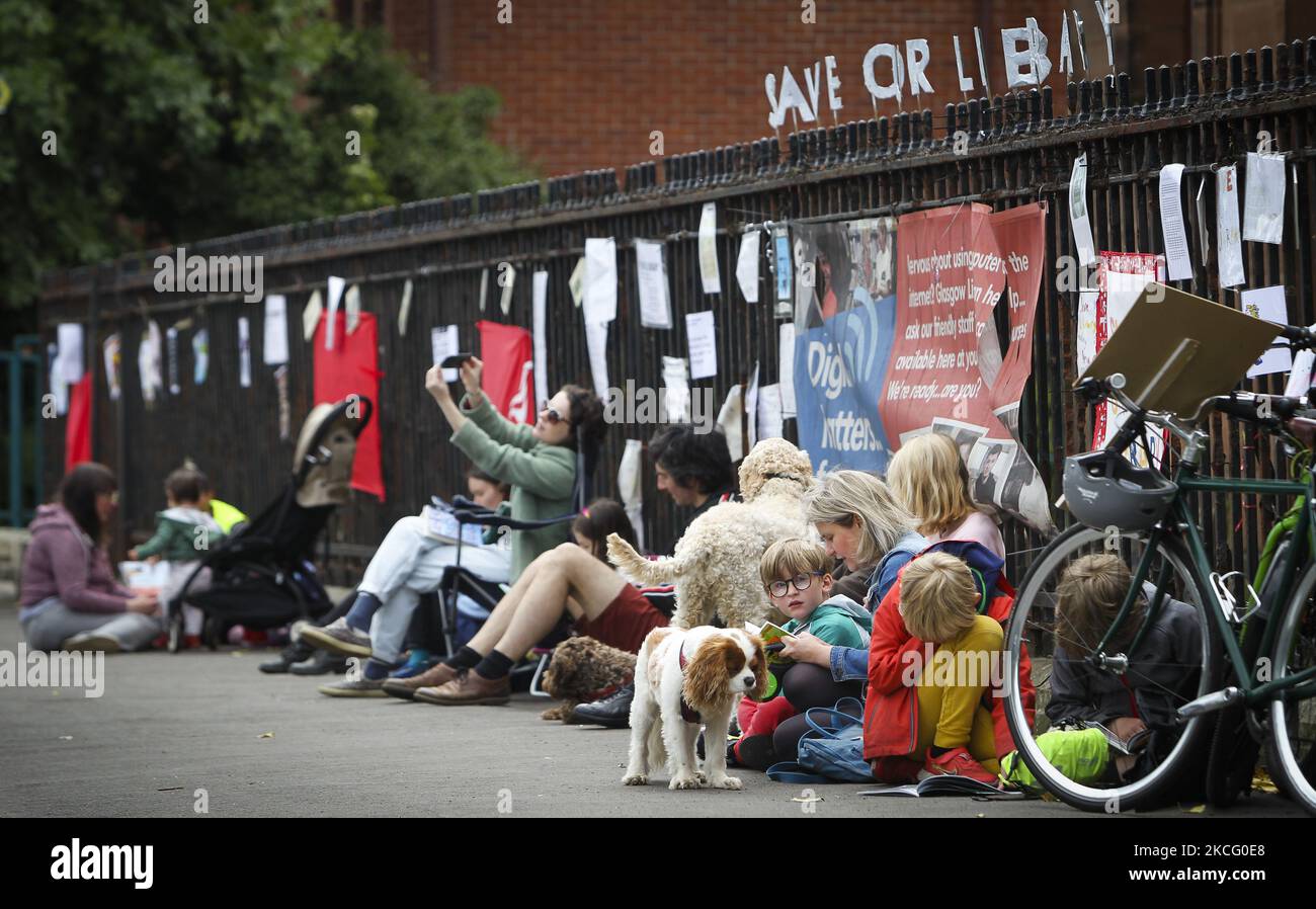 Protestors take part in a library read-in outside Whiteinch Library on ...
