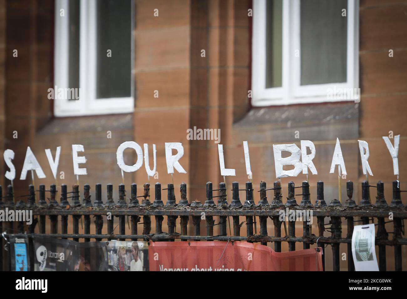 Protestors take part in a library read-in outside Whiteinch Library on ...