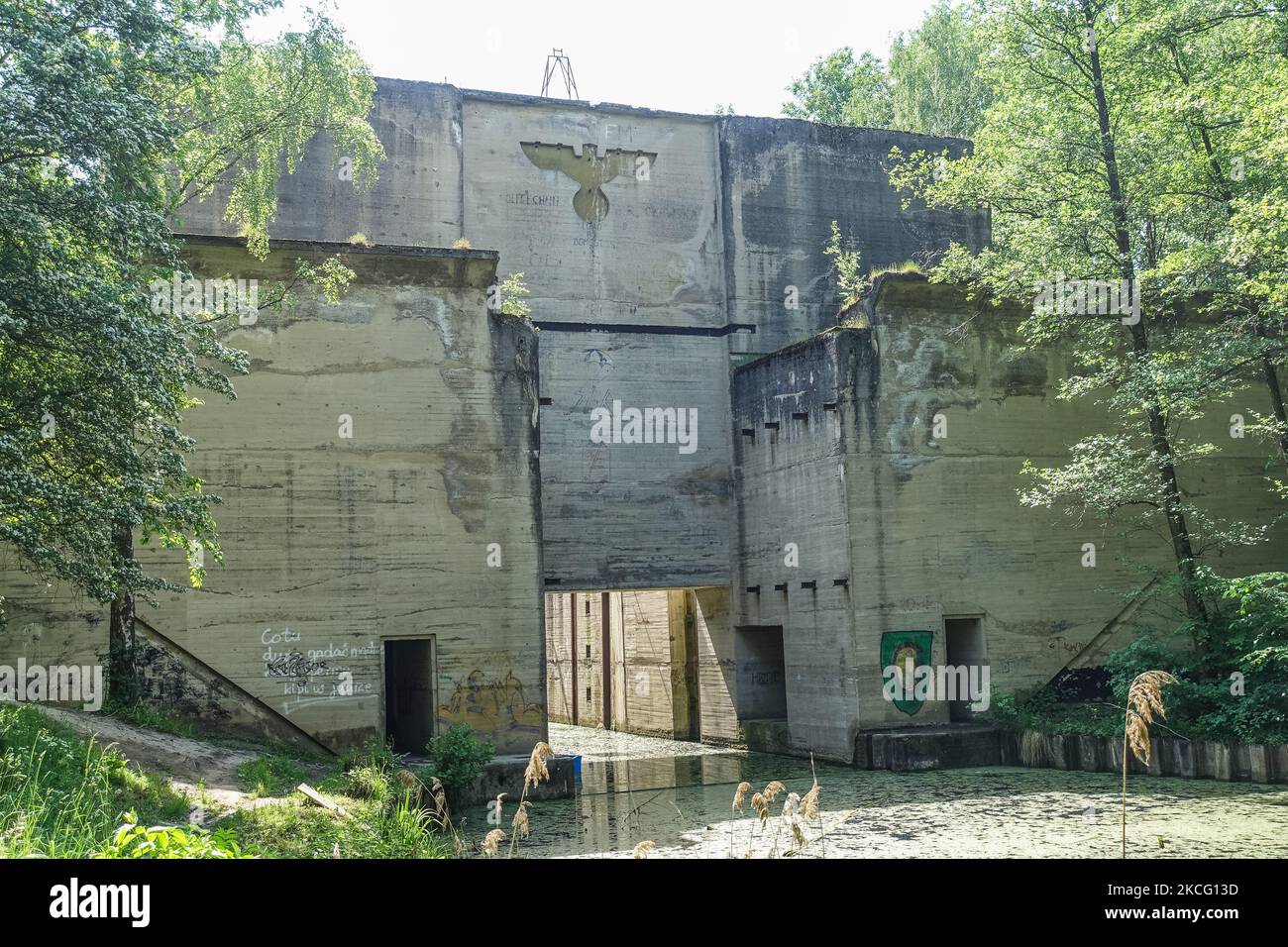 Remains of Nazi insignia on the unfinished sluice of the Masurian ...