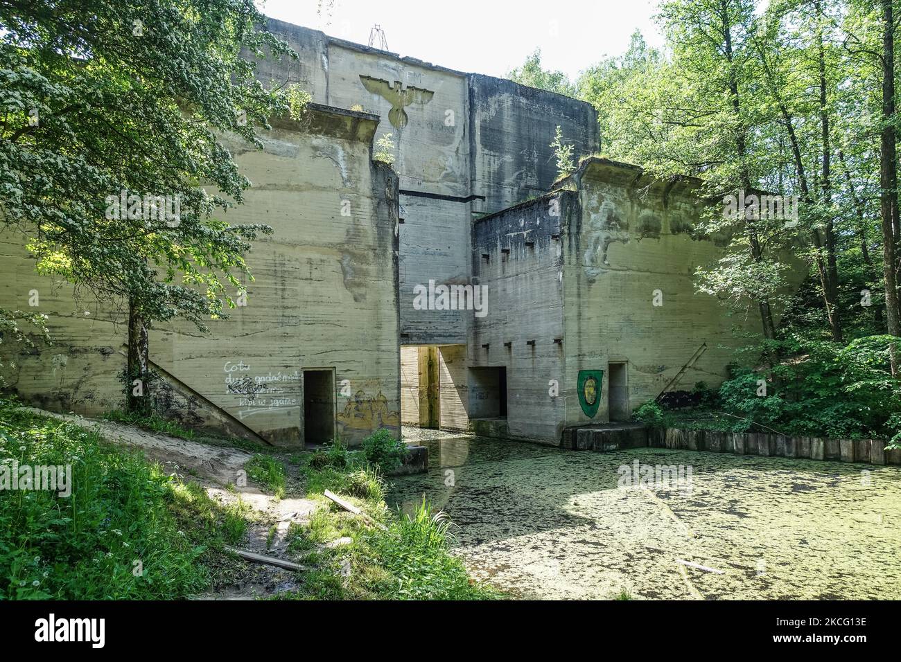 Remains of Nazi insignia on the unfinished sluice of the Masurian ...