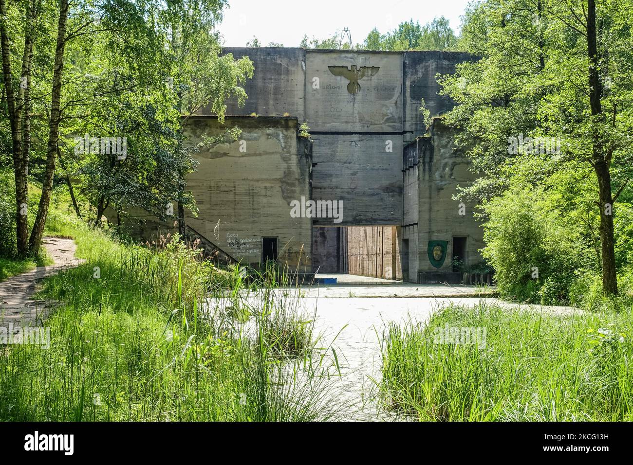 Remains of Nazi insignia on the unfinished sluice of the Masurian ...
