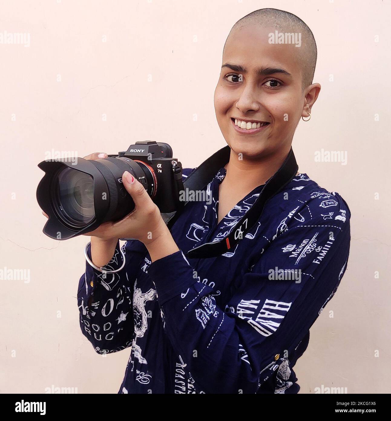 22-Year old Varsha Kumawat poses for a photograph after shaving her ...