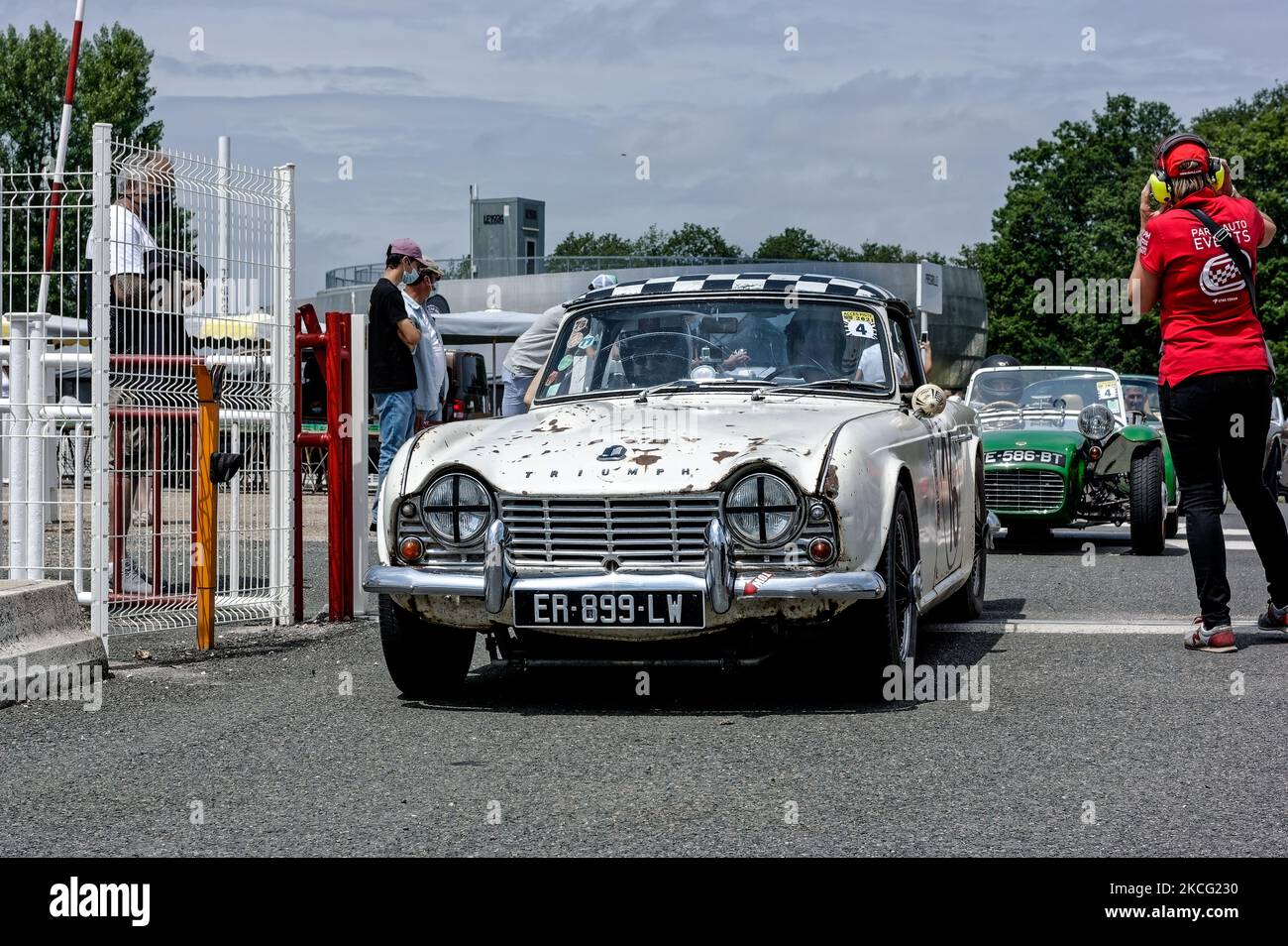 Old Triumph TR4 go to the starting Grid before the Car Racing of 'God ...