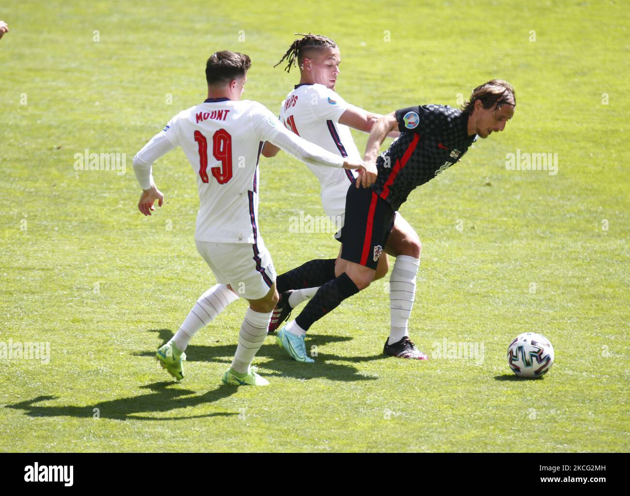 WEMBLEY, United Kingdom, JUNE 13: Luka Modric of Croatia under pressure ...