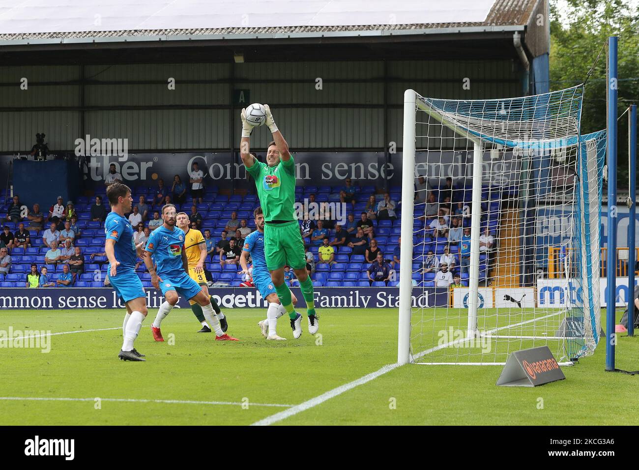 Ben Hinchliffe of Stockport County claims a cross during the Vanarama ...