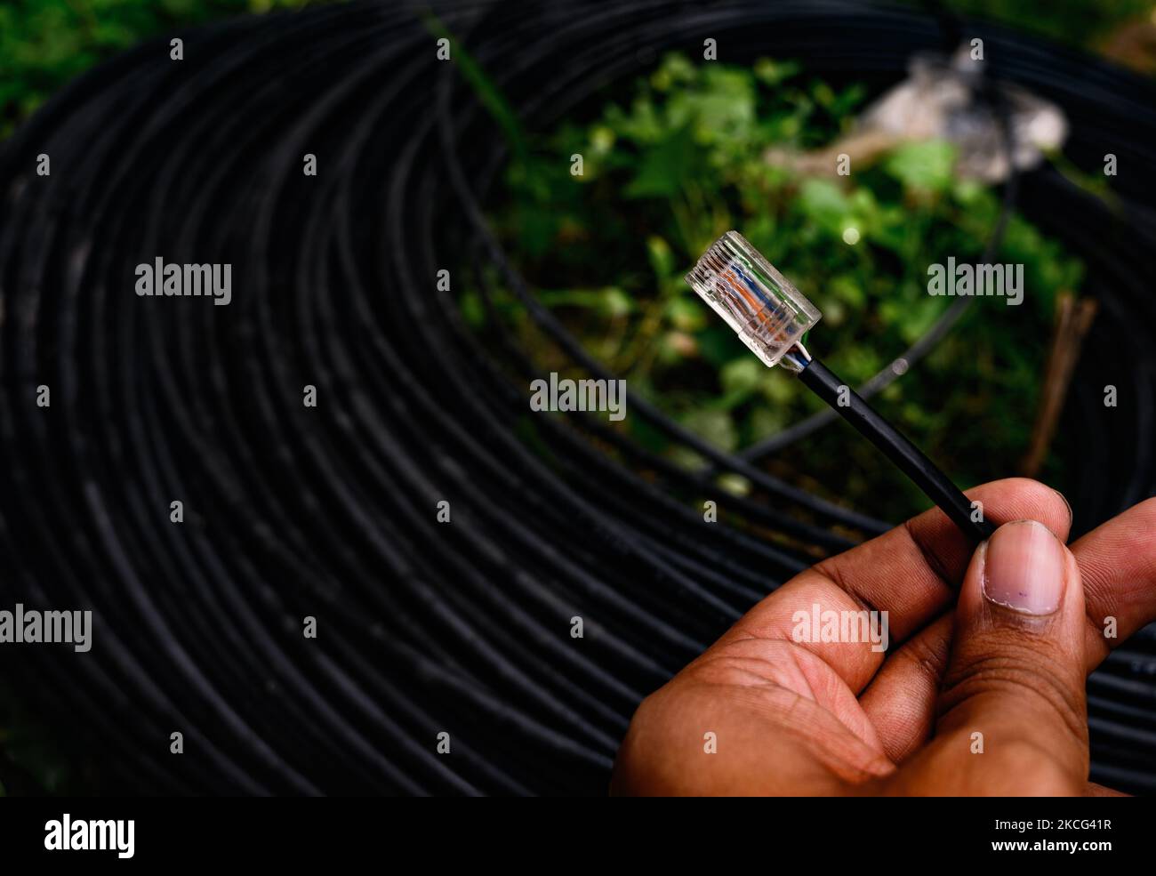 An employee of an Internet wired broadband service provider is ...