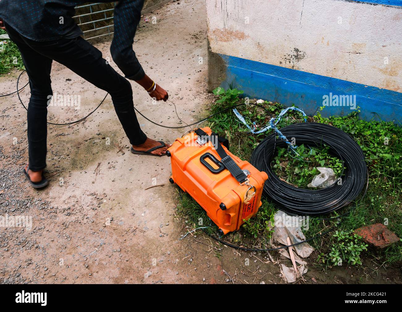 An employee of an Internet wired broadband service provider is ...
