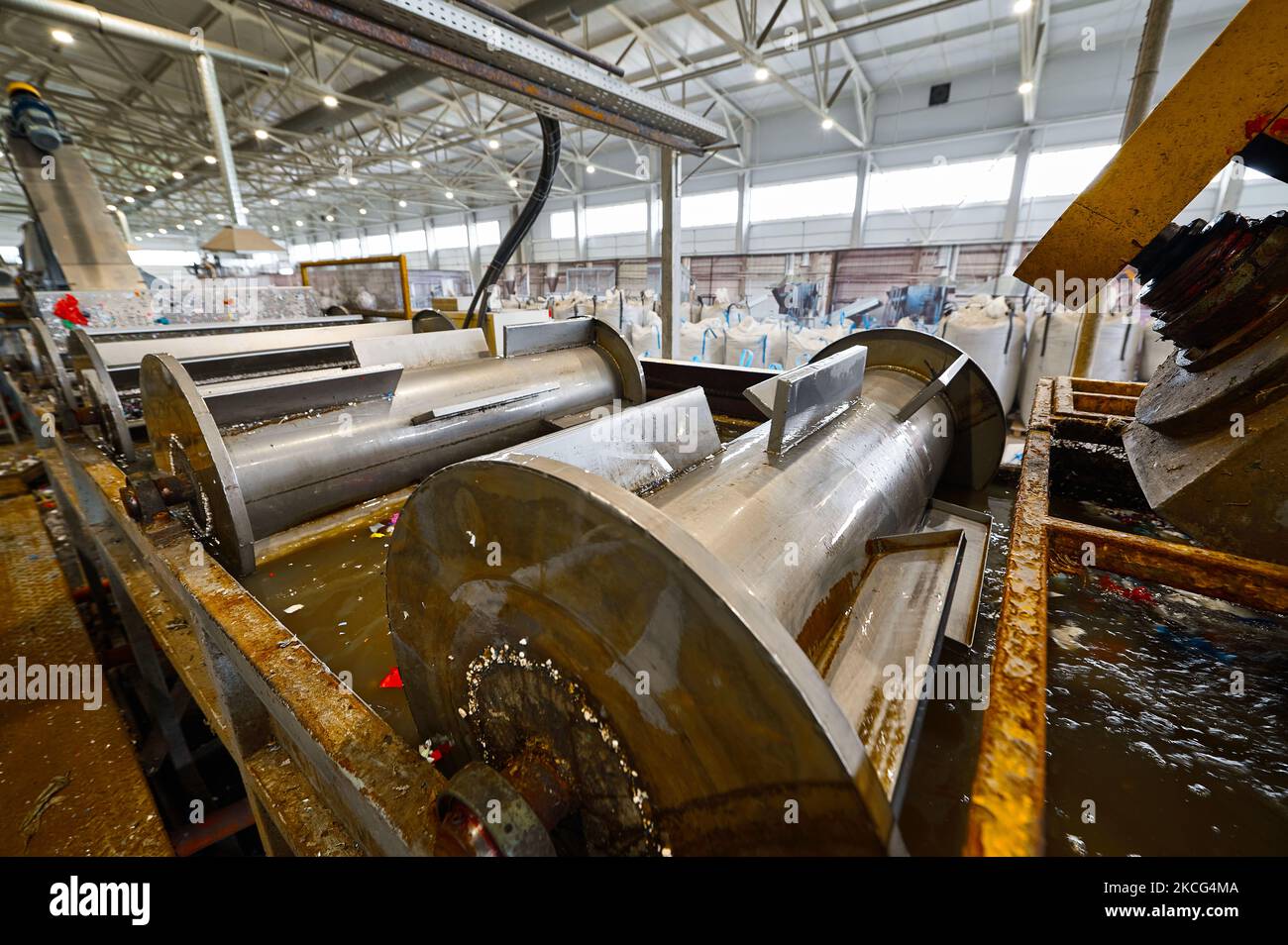 Automatic washing machine for shredded garbage plastic. Close-up of ...