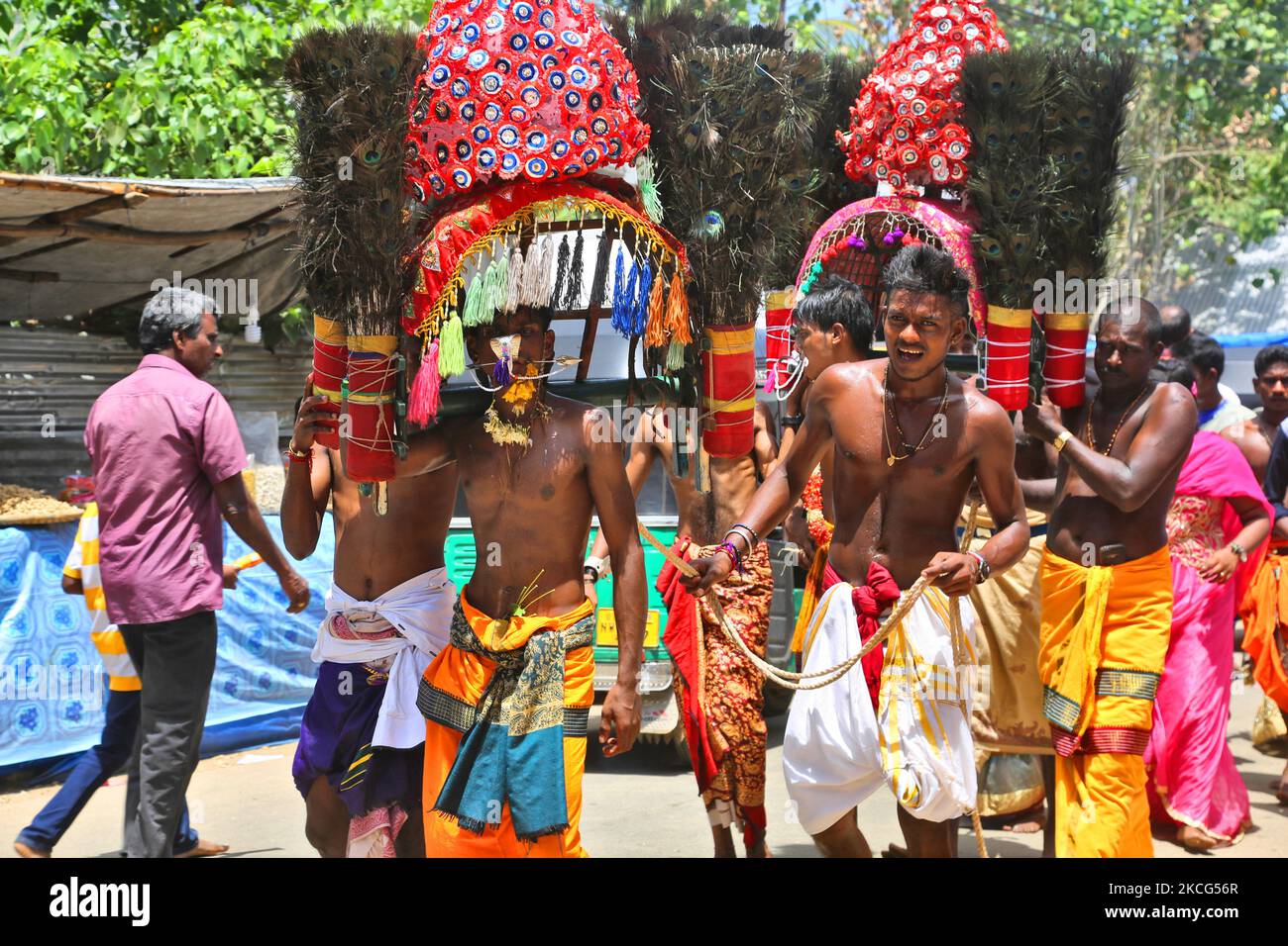 Tamil Hindu devotees performing the Kavadi Attam dance during the ...