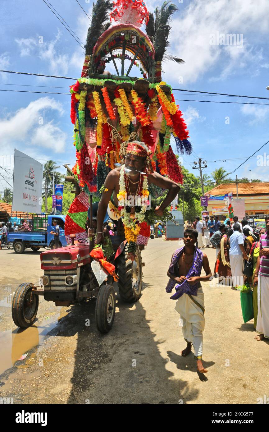 Tamil Hindu devotee performing the para-kavadi ritual (where they are ...