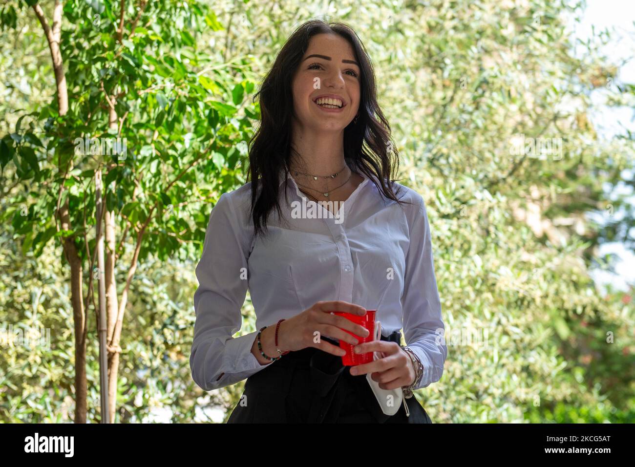 A fifth-year student smiles as she has finished her high-school leaving ...