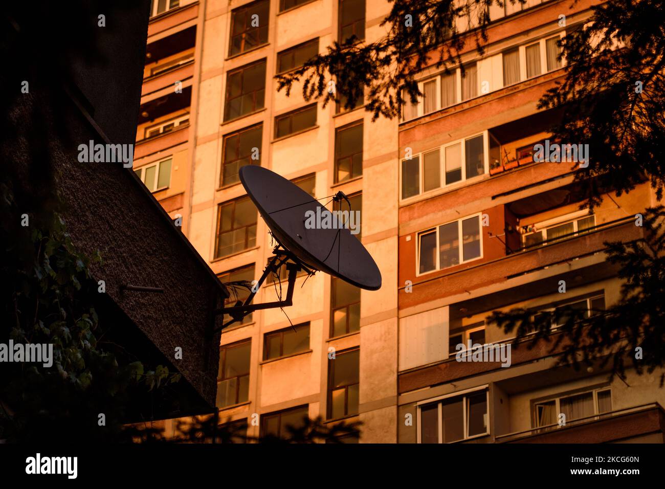 Old satellite dish used for receiving television has its antenna wire ...