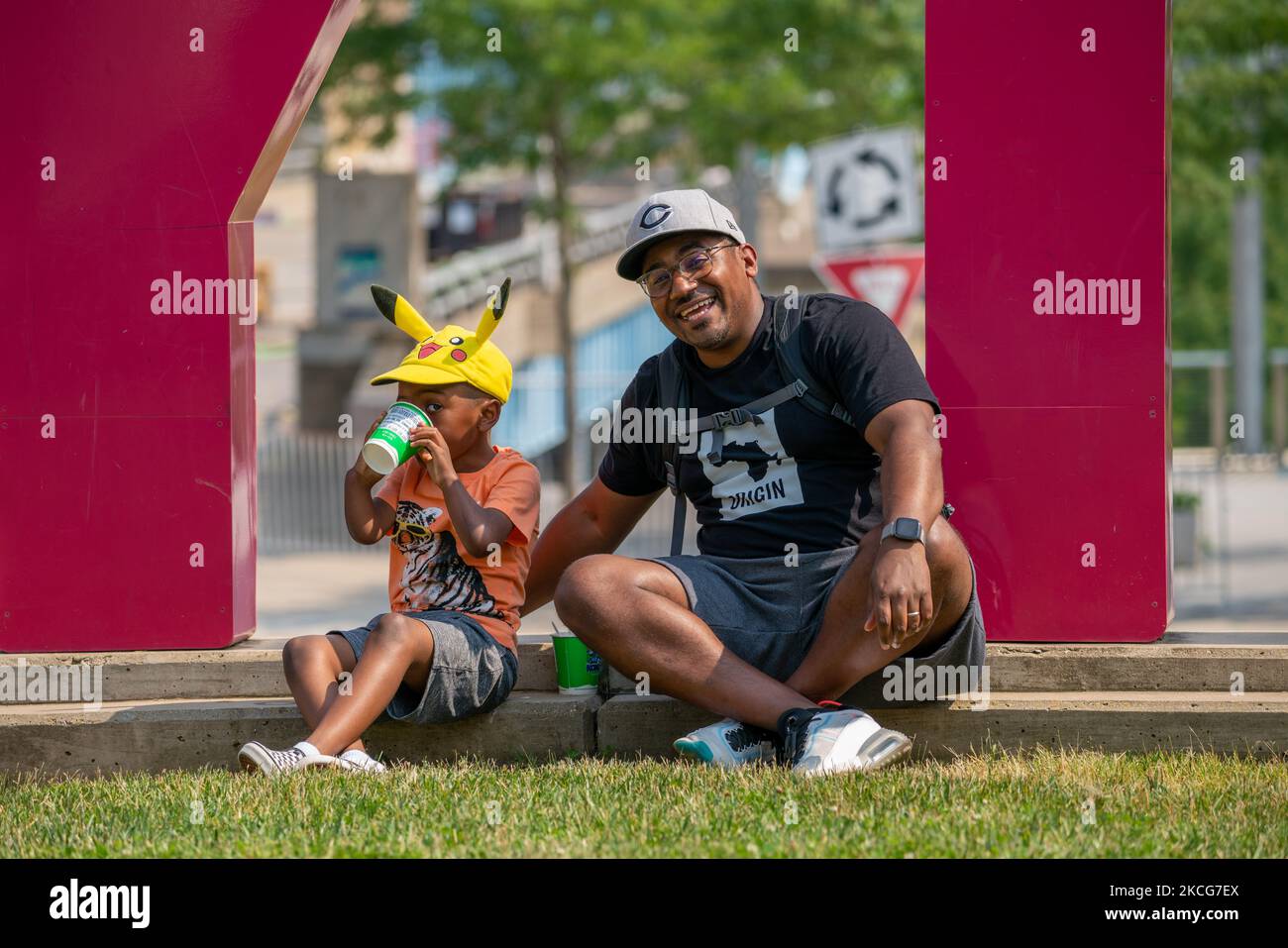 A man and his some pose for a photograph during the annual Juneteenth ...