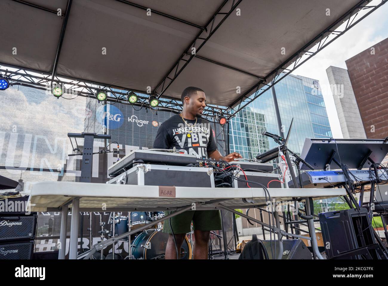 A DJ plays music during the annual Juneteenth block party at The Banks ...