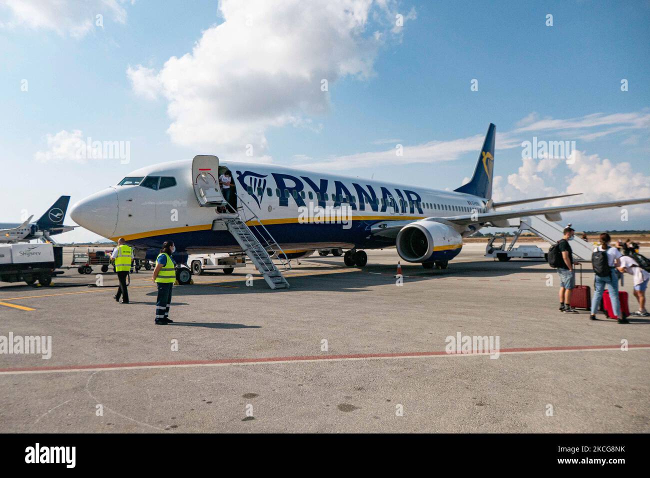 The Boeing 737 of Ryanair budget carrier while passengers leave the ...