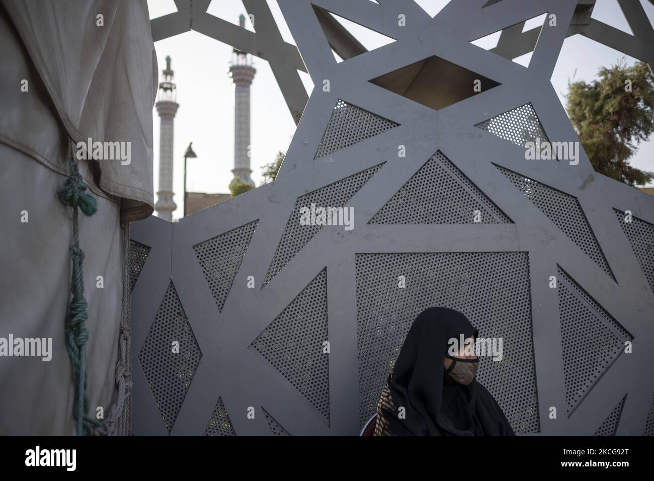 A supporter of the Iranian president elect Ebrahim Raisi attends a ...