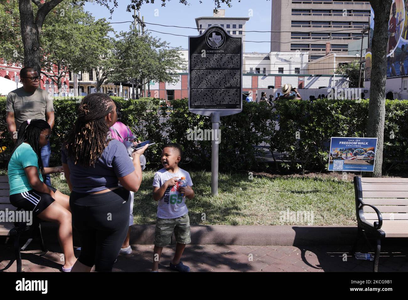 A woman reads a new Juneteenth plaque in Galveston, Texas on June 19th ...