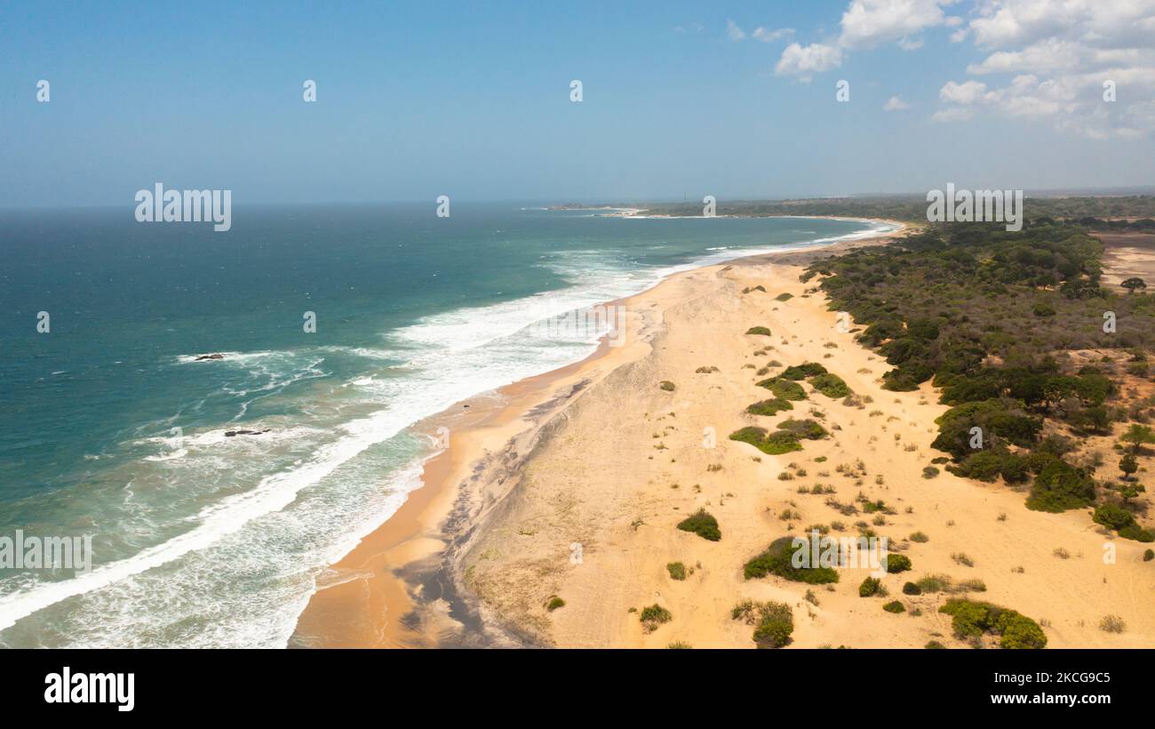 Tropical landscape with beautiful sandy beach and blue ocean. Peanut ...