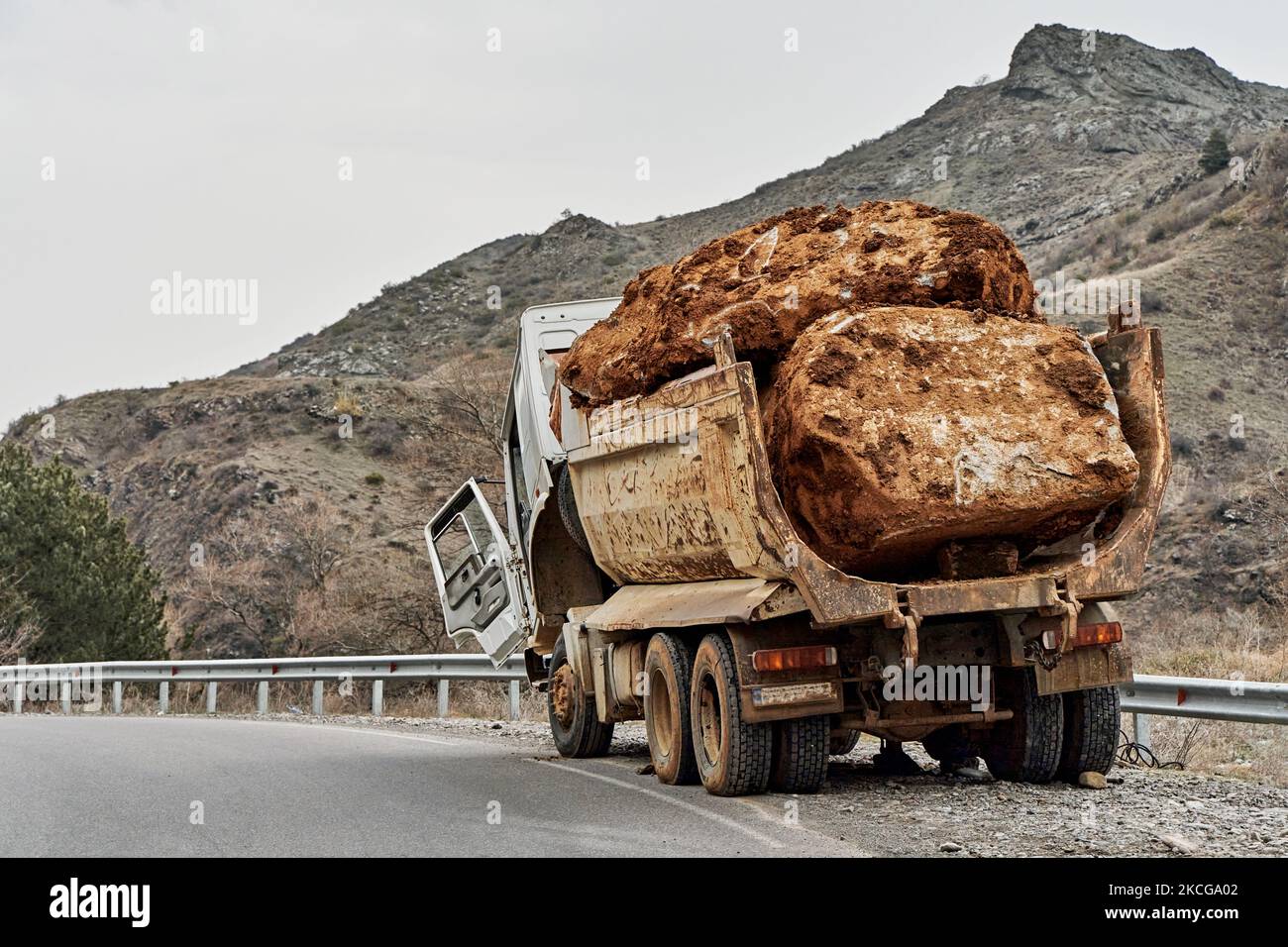 Lorry carrying dumper truck hi-res stock photography and images - Alamy