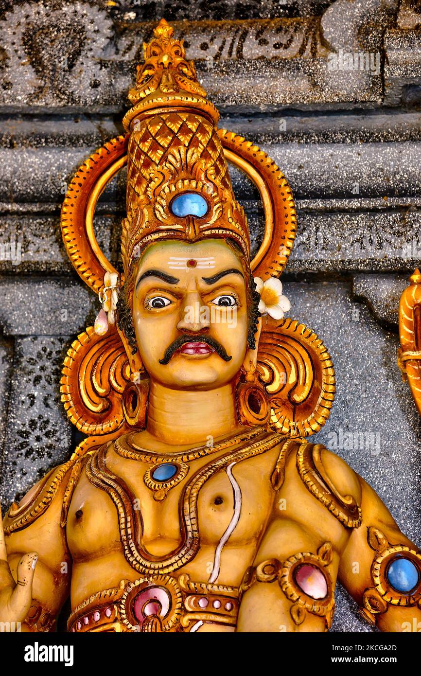 Statue of a guardian at the entrance of the at the Arasadi Vinayagar ...