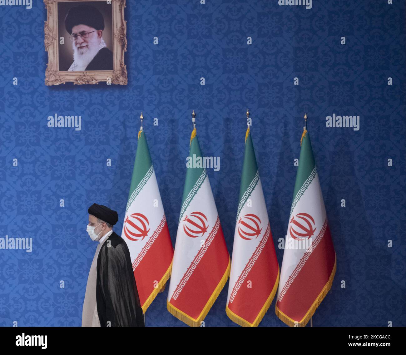 Iranian President elect Ebrahim Raisi arrives a conference hall for ...