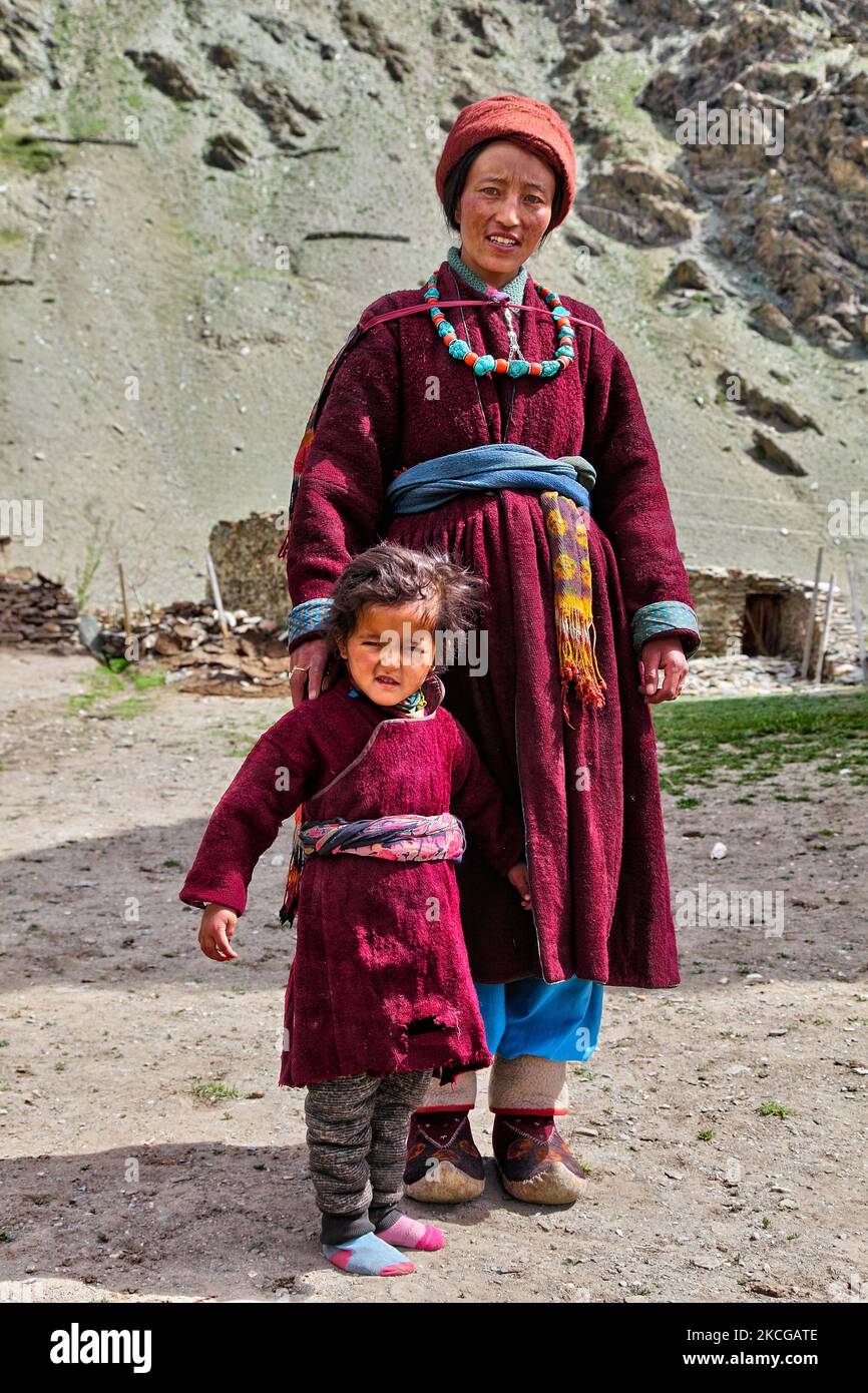 Ladakhi (Zanskari) woman and child wearing traditional clothing in a ...