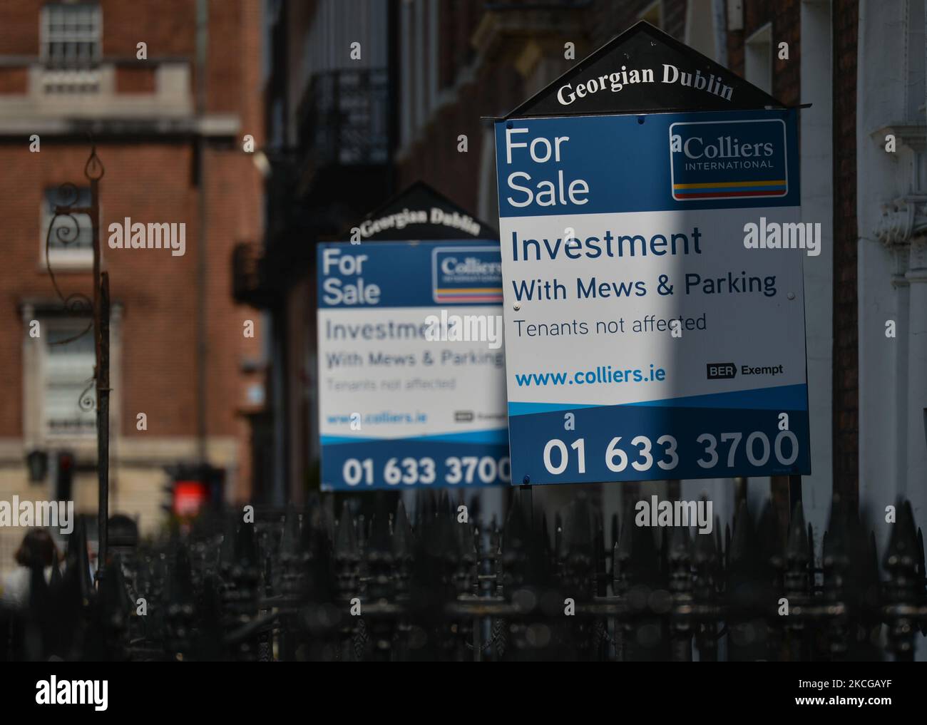 'FOR SALE' signs seen in front of a Georgian building in Dublin City ...