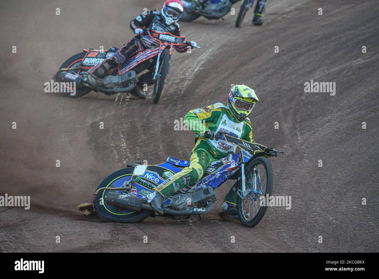 Chris Holder (Australia) (Yellow) leads Luke Becker (USA) (Red) during ...
