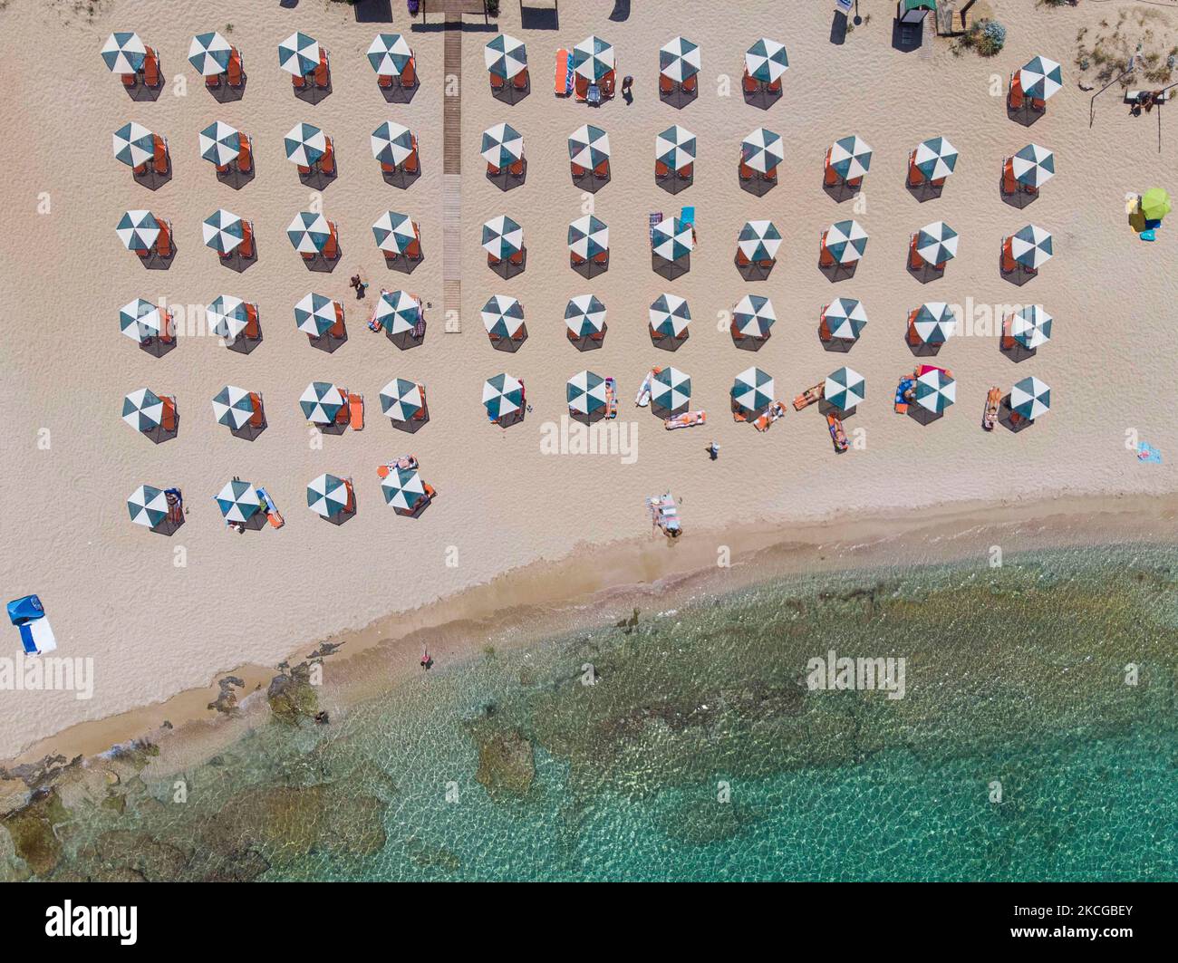 Beautiful greek woman in bikini hi-res stock photography and images - Alamy